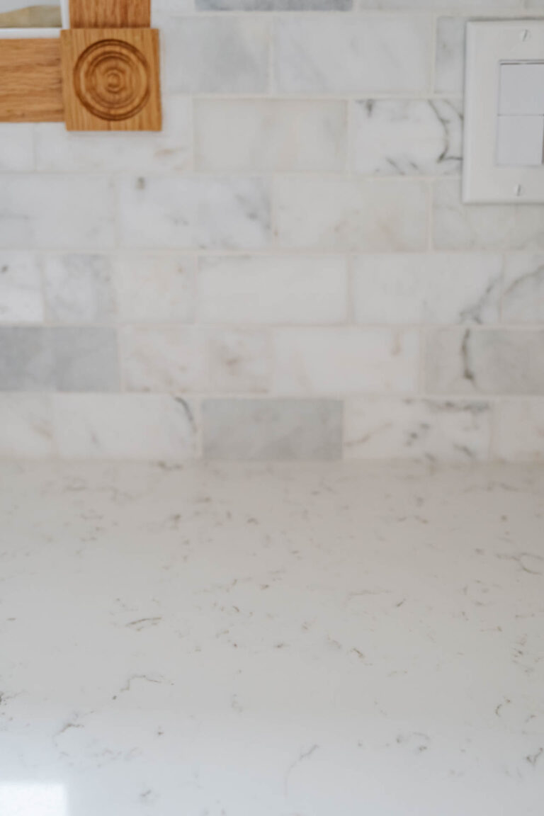 A Bright Transformation with Irah Carrara Gold Countertops | CNG Stone ...